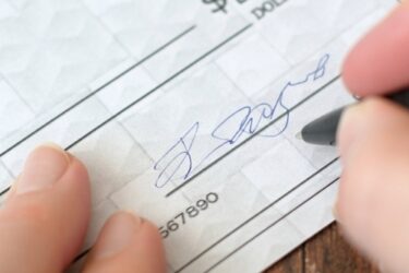 The Complete Guide to Where to Sign a Check | Remitly